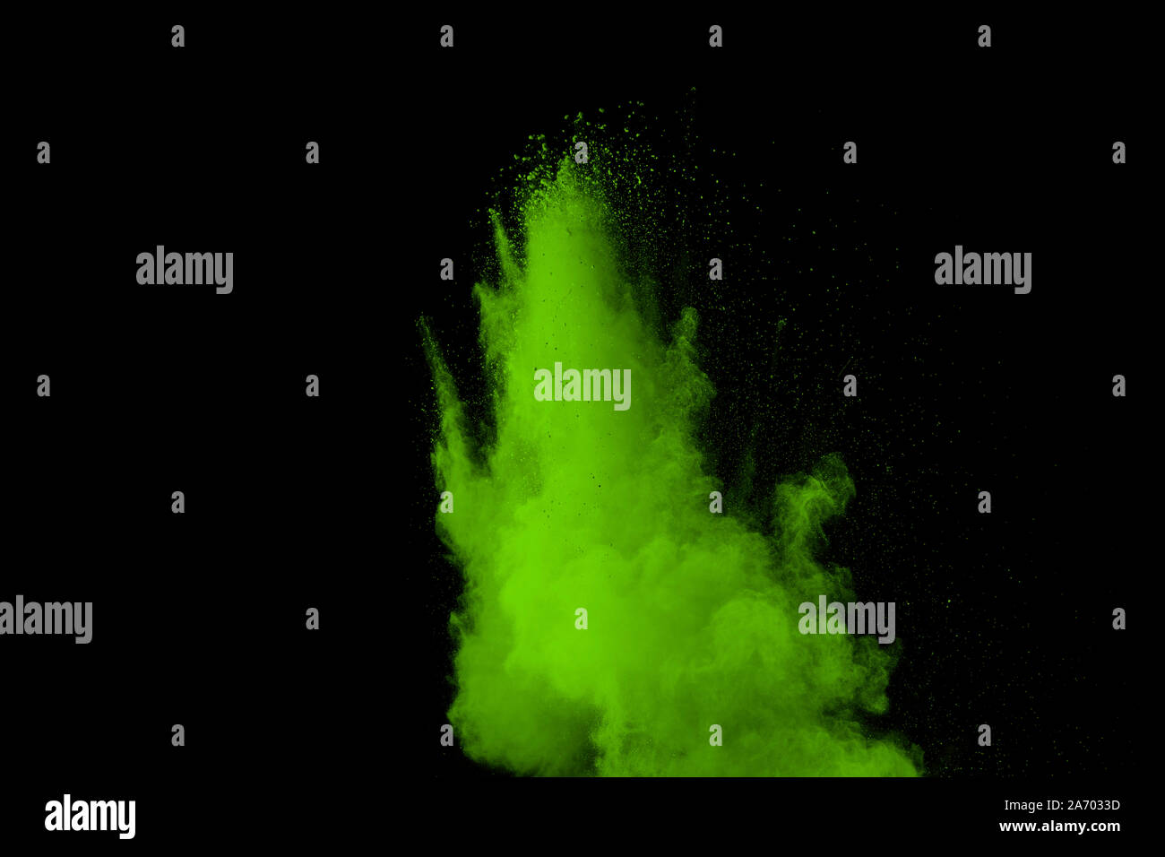 Green powder explosion on black background Stock Photo - Alamy