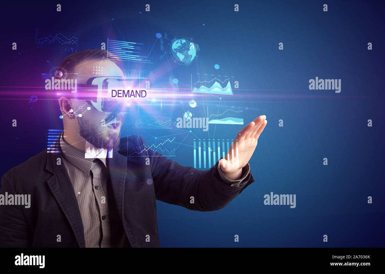 Businessman looking through Virtual Reality glasses with DEMAND ...