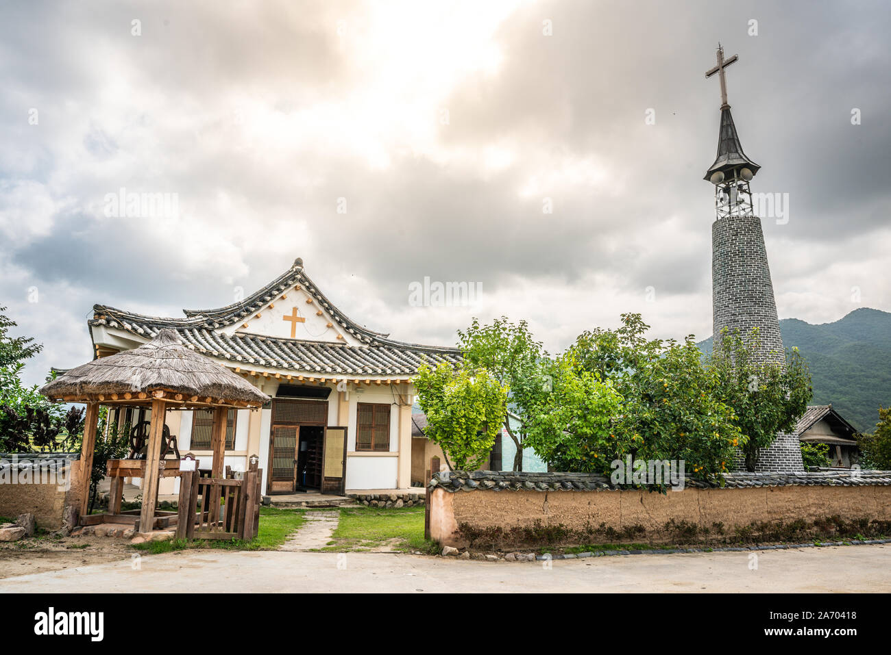 Korean style church and cross in historic Hahoe folk village with ...