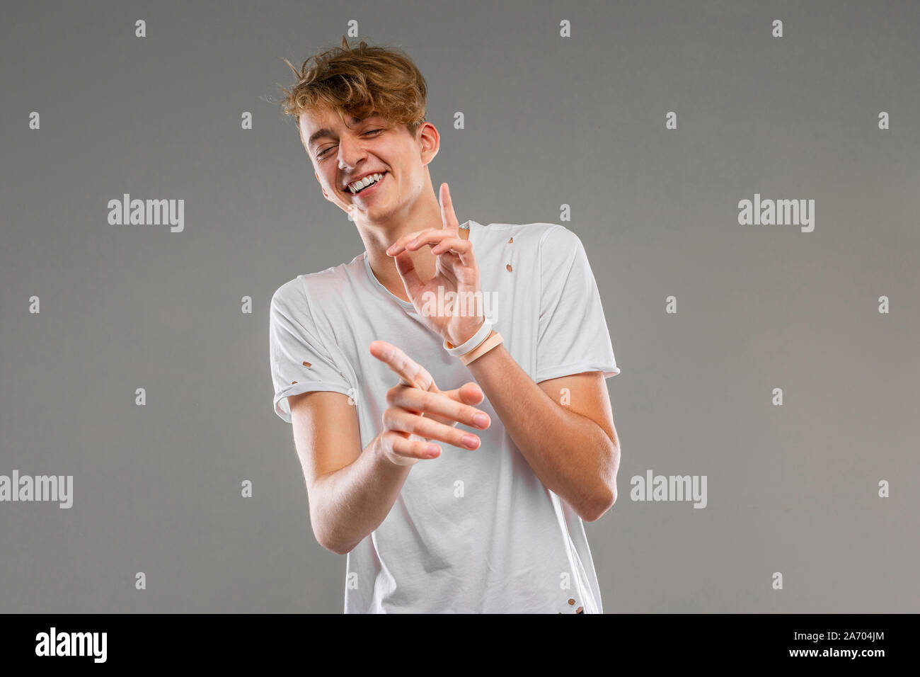 Mocking Smile High Resolution Stock Photography and Images - Alamy