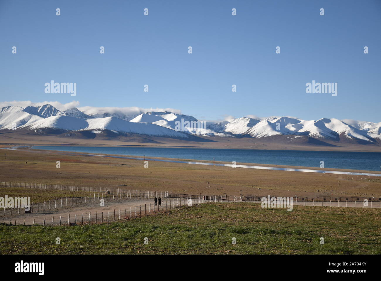 View of Namtso lake with snow capped mountains, Tibet. Namtso is the ...