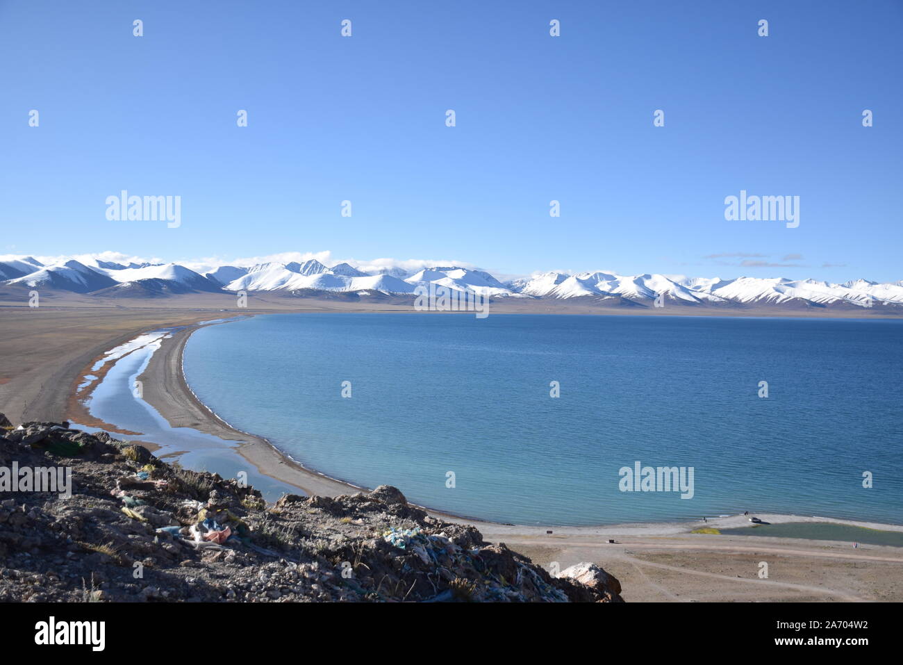 View of Namtso lake with snow capped mountains, Tibet. Namtso is the ...