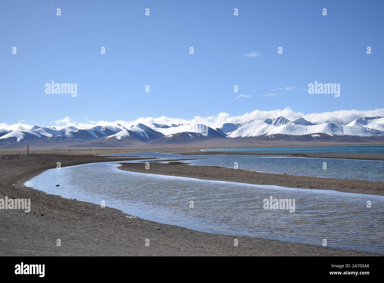 View of Namtso lake with snow capped mountains, Tibet. Namtso is the ...