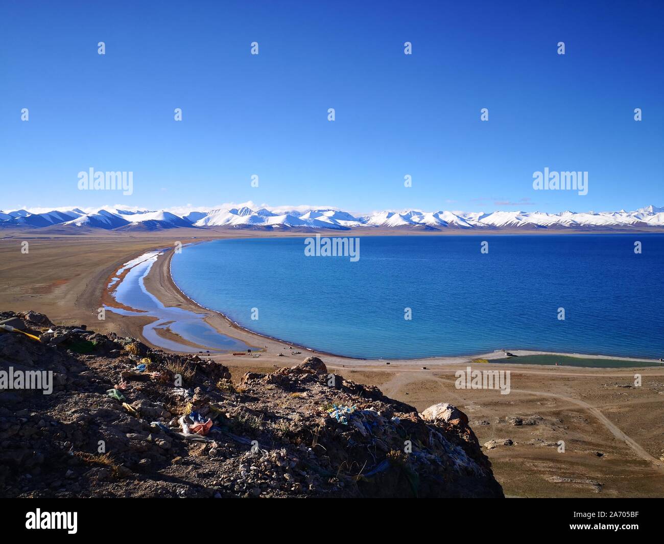 View of Namtso lake with snow capped mountains, Tibet. Namtso is the ...