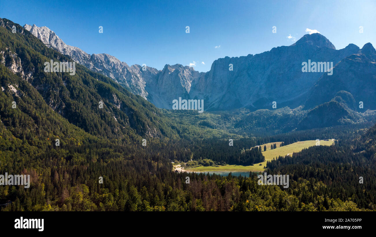 Alpine Blue Water Lake in Woodlands. Fusine Lake Italy. Drone View ...