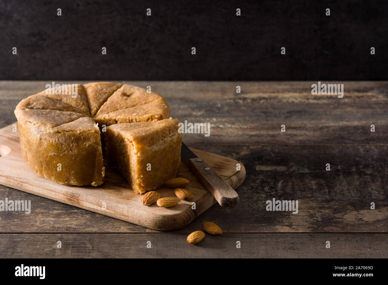 Traditional Christmas marzipan on wooden table. Copy space Stock Photo ...
