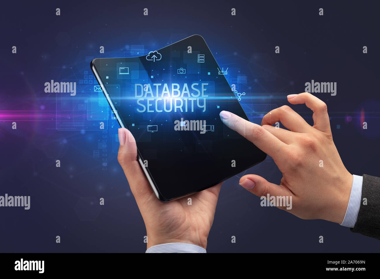 Businessman holding a foldable smartphone with DATABASE SECURITY ...