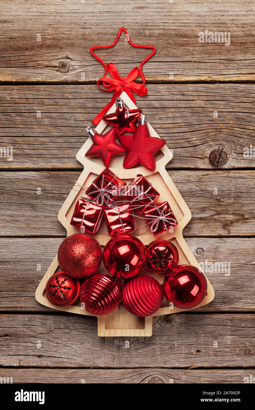 Christmas greeting card with xmas decor in fir tree shaped box on ...