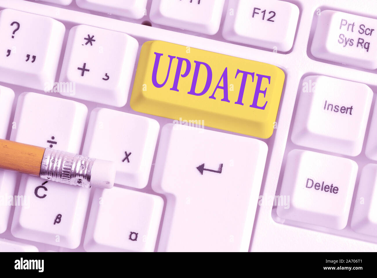 Writing note showing Update. Business concept for make something more ...