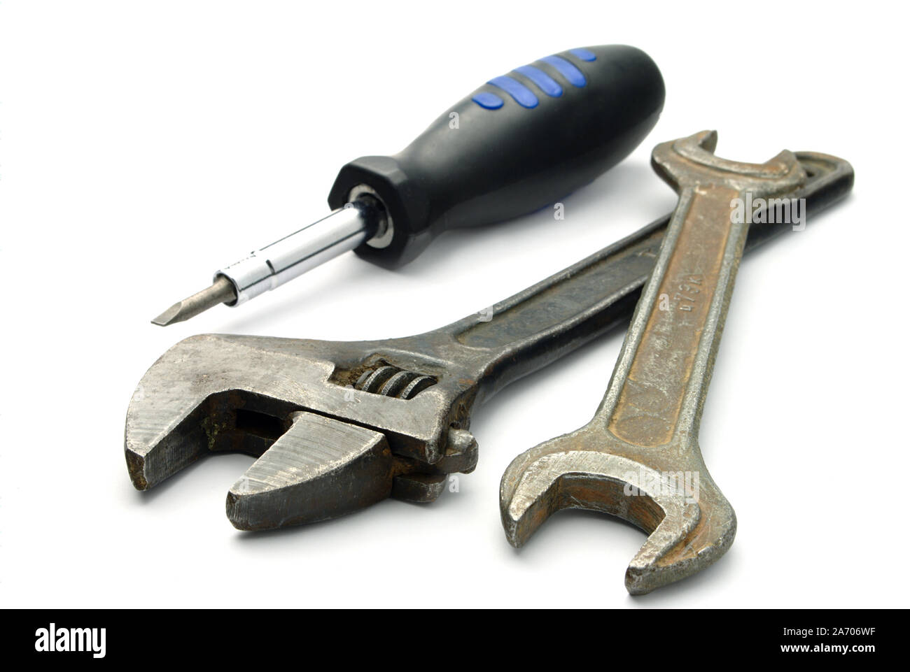 screwdriver and two wrenches on a white background Stock Photo - Alamy
