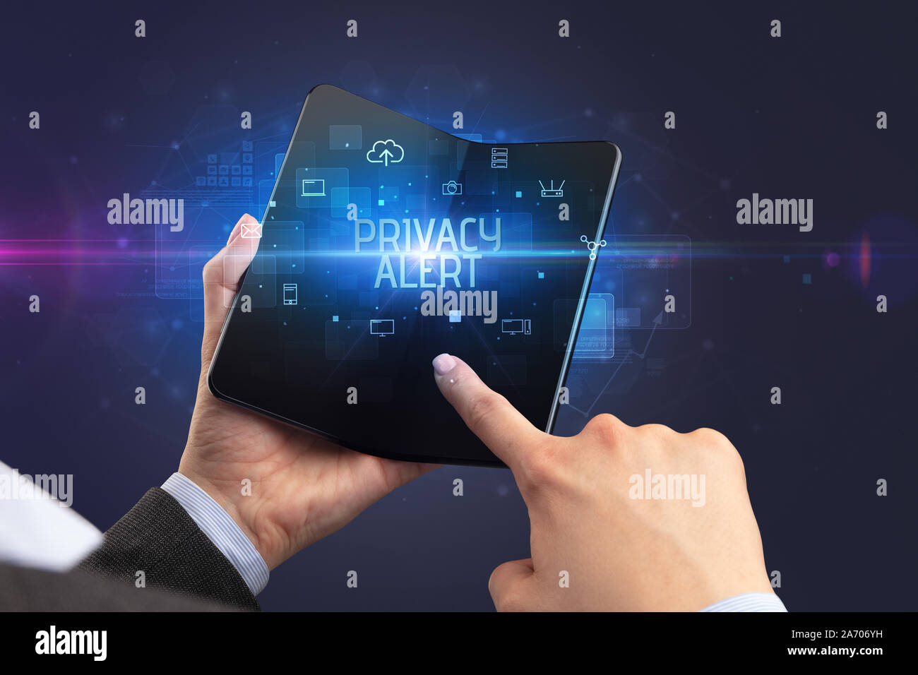 Businessman holding a foldable smartphone with PRIVACY ALERT ...