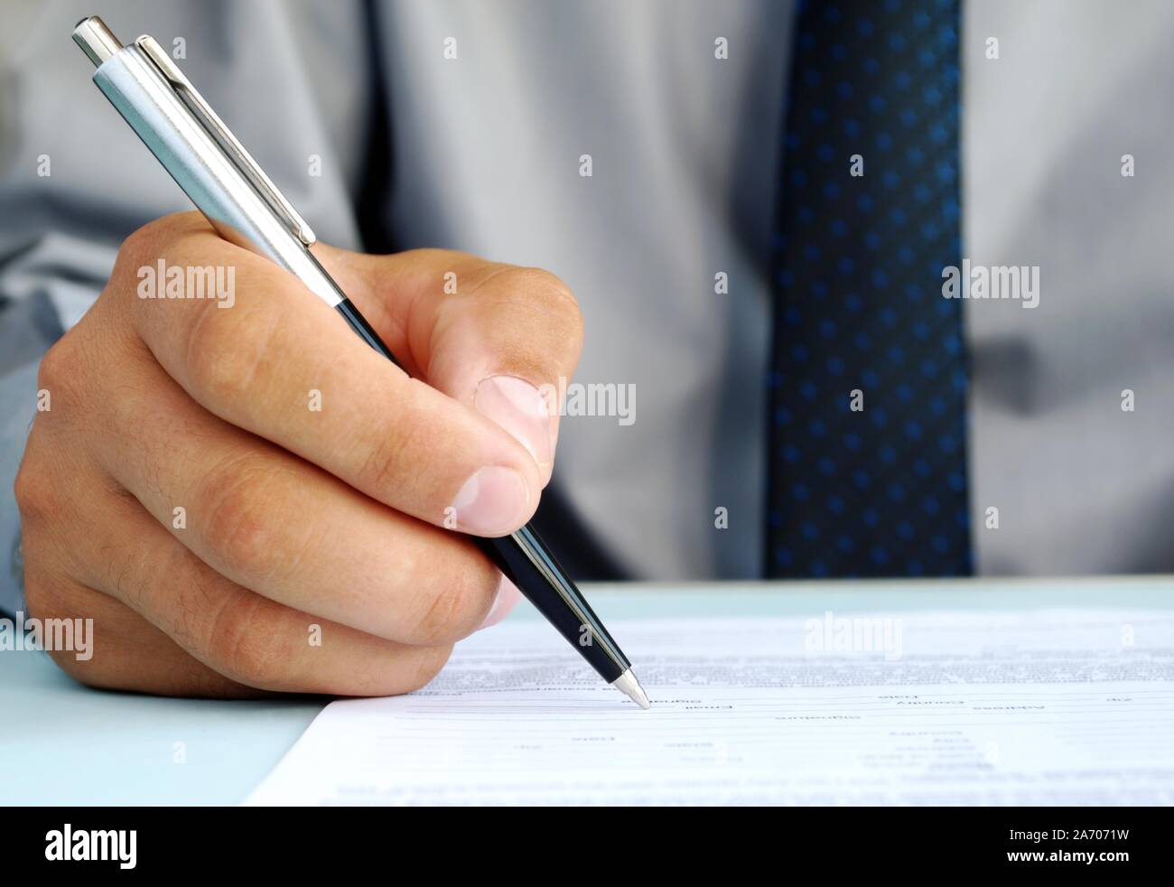 the hand of the man does entries in official papers Stock Photo - Alamy