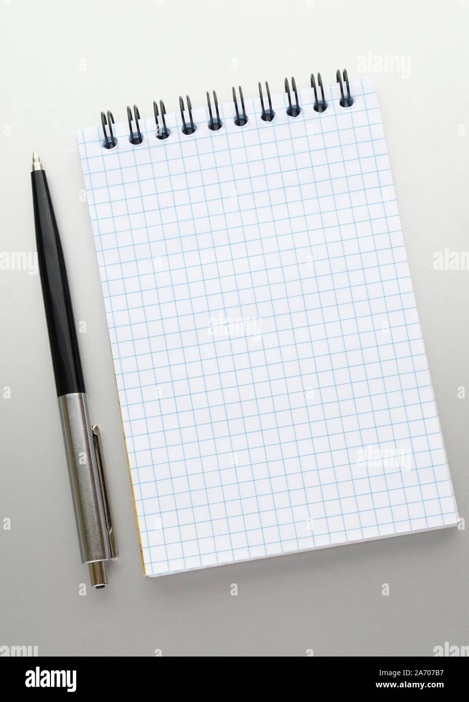 ballpoint pen and an open notebook Stock Photo - Alamy