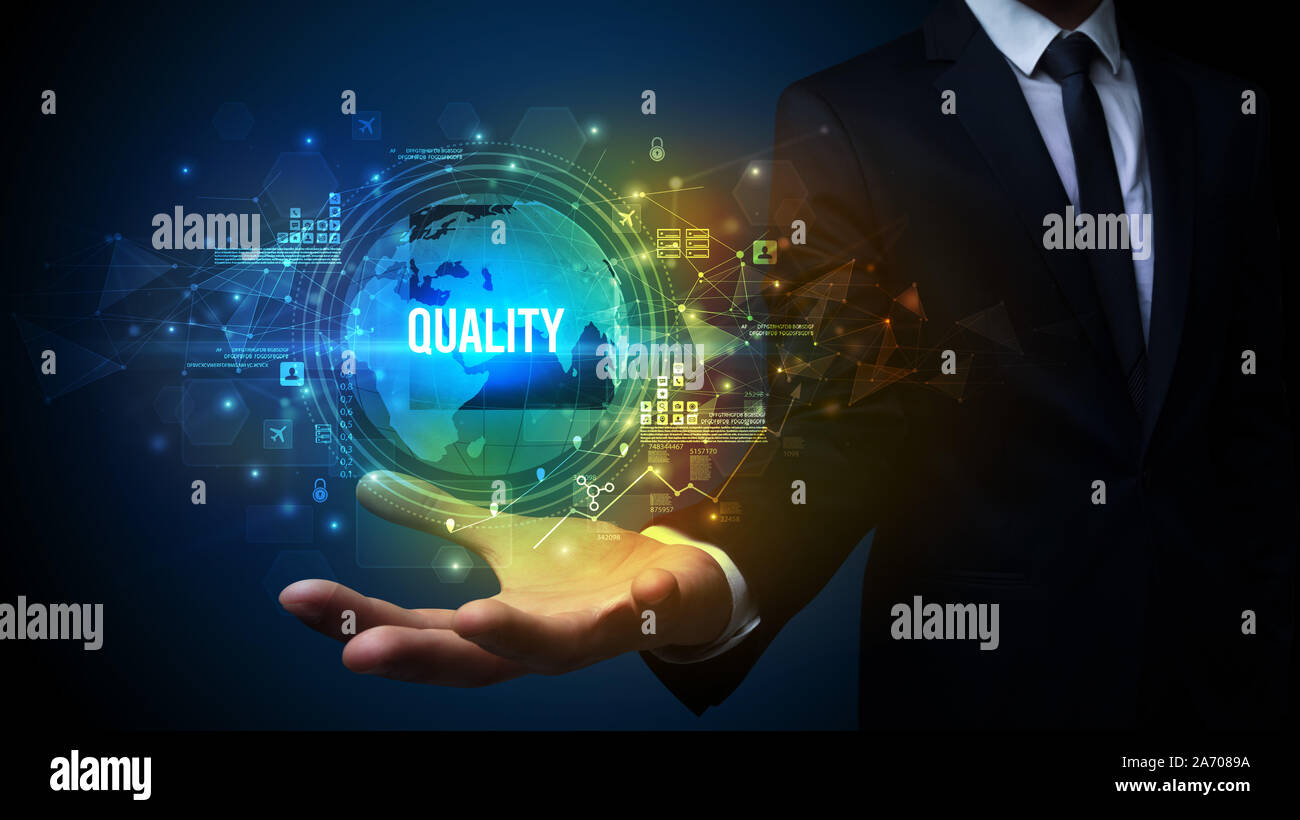 Elegant hand holding QUALITY inscription, digital technology concept ...
