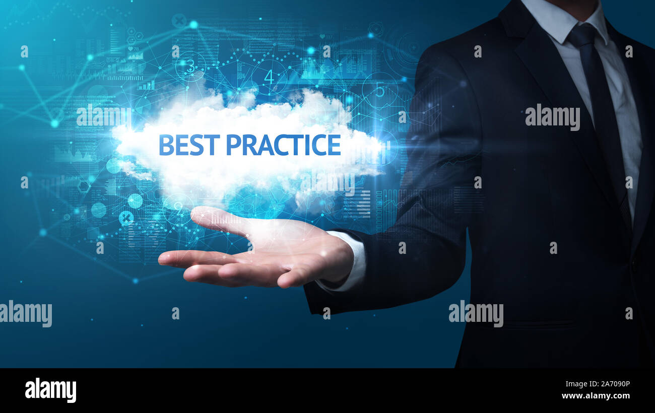 Hand of Businessman holding BEST PRACTICE inscription, successful ...