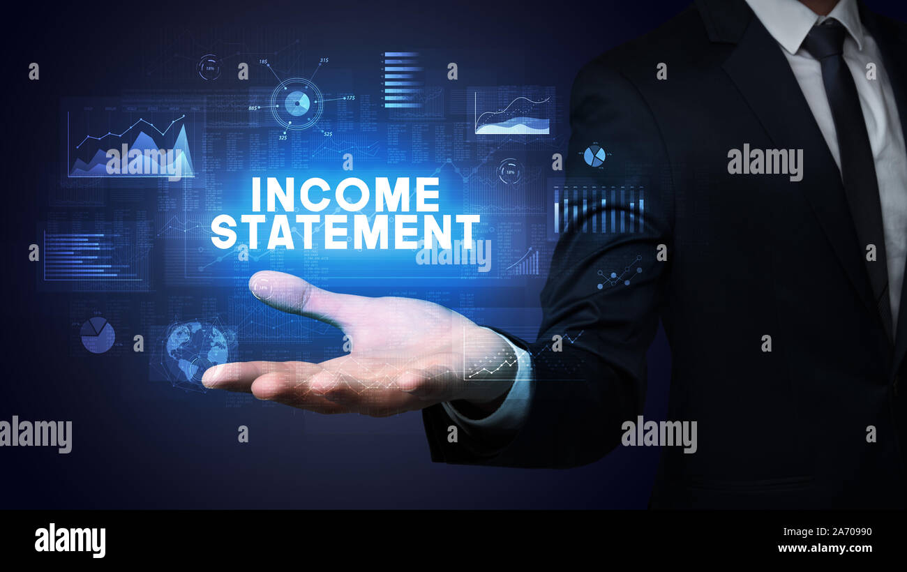 Hand of Businessman holding INCOME STATEMENT inscription, business ...