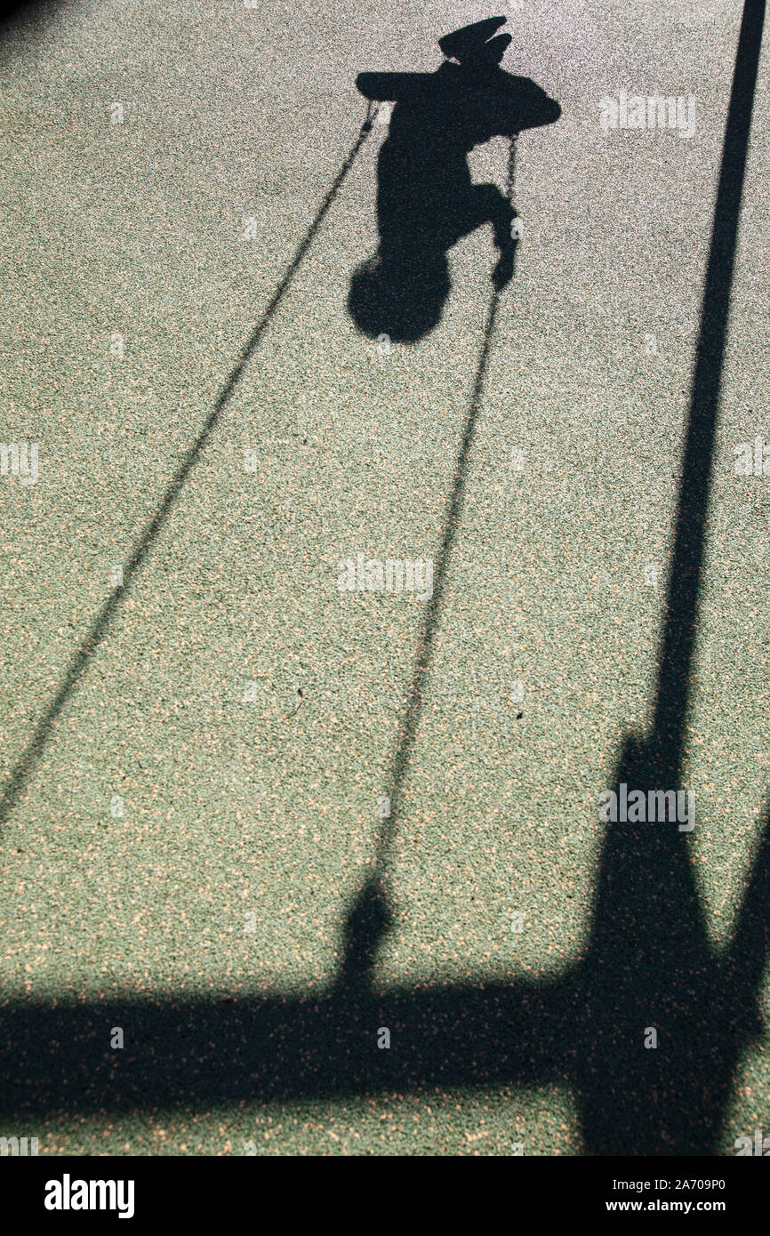 Little girl on the swing hi-res stock photography and images - Alamy