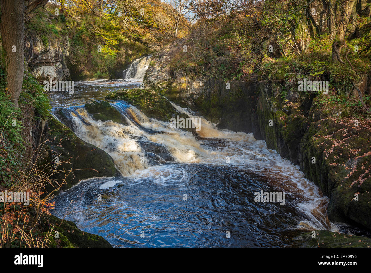 The river Doe tumbles down the Ingleton waterfalls trail in North ...