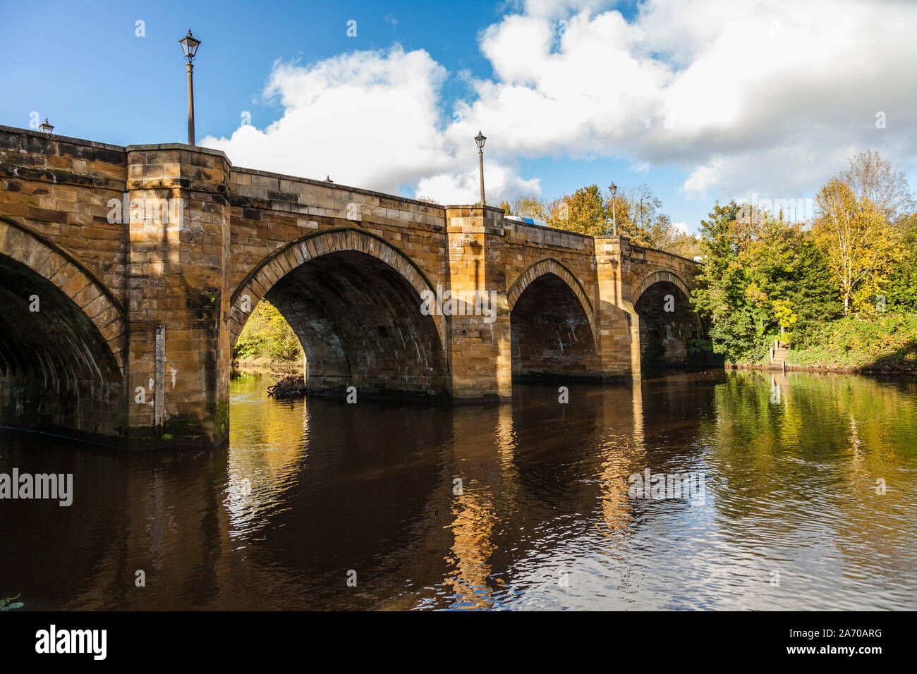 A scenic view of the River Tees at Yarm showing the road bridge and ...