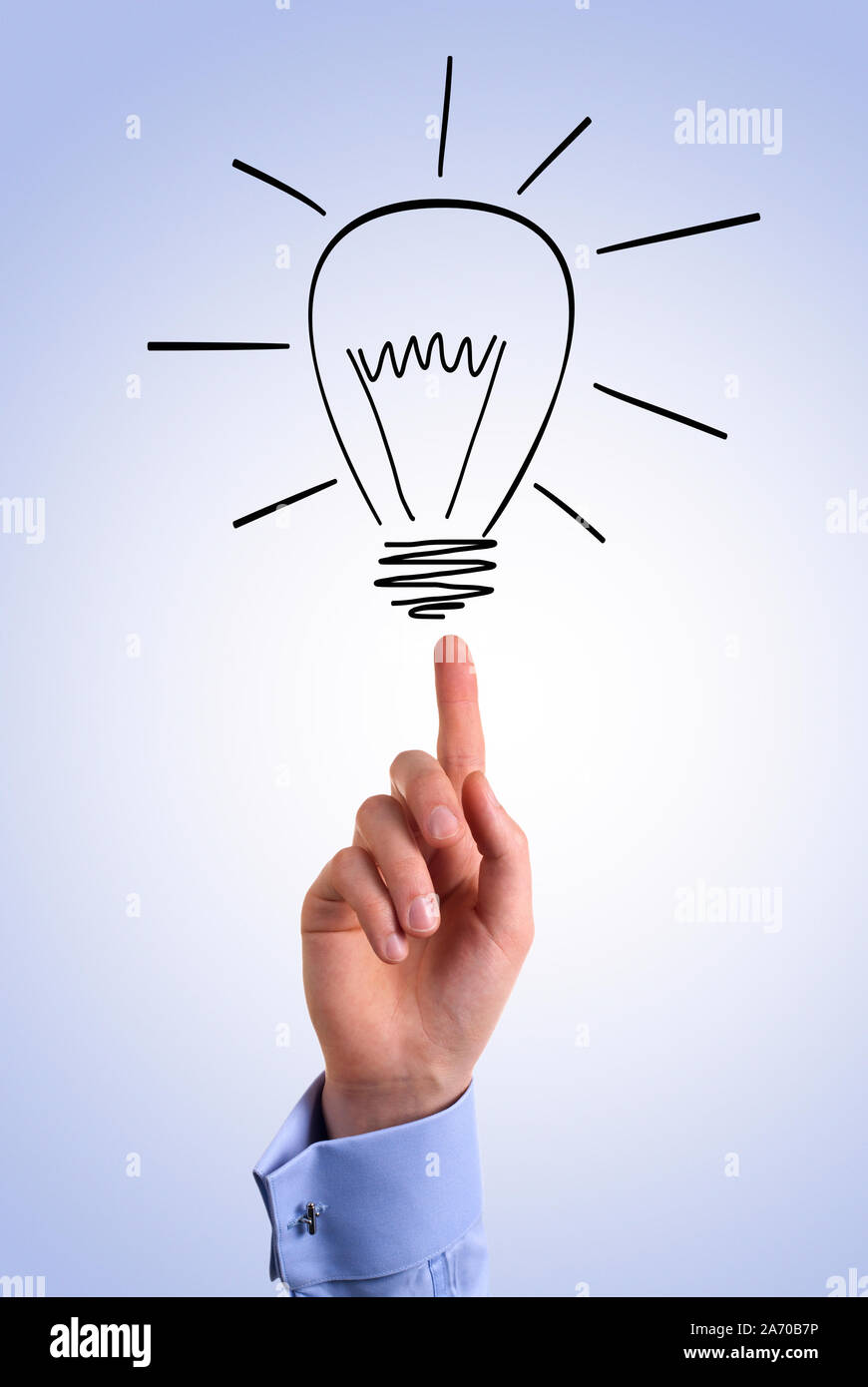 Businessman points finger at the light bulb Stock Photo - Alamy