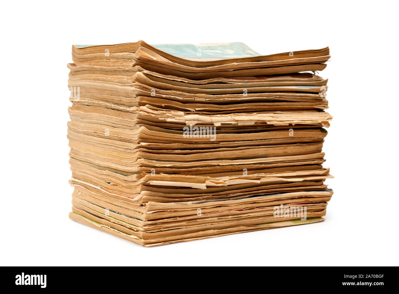 a stack of old magazines on white background Stock Photo - Alamy