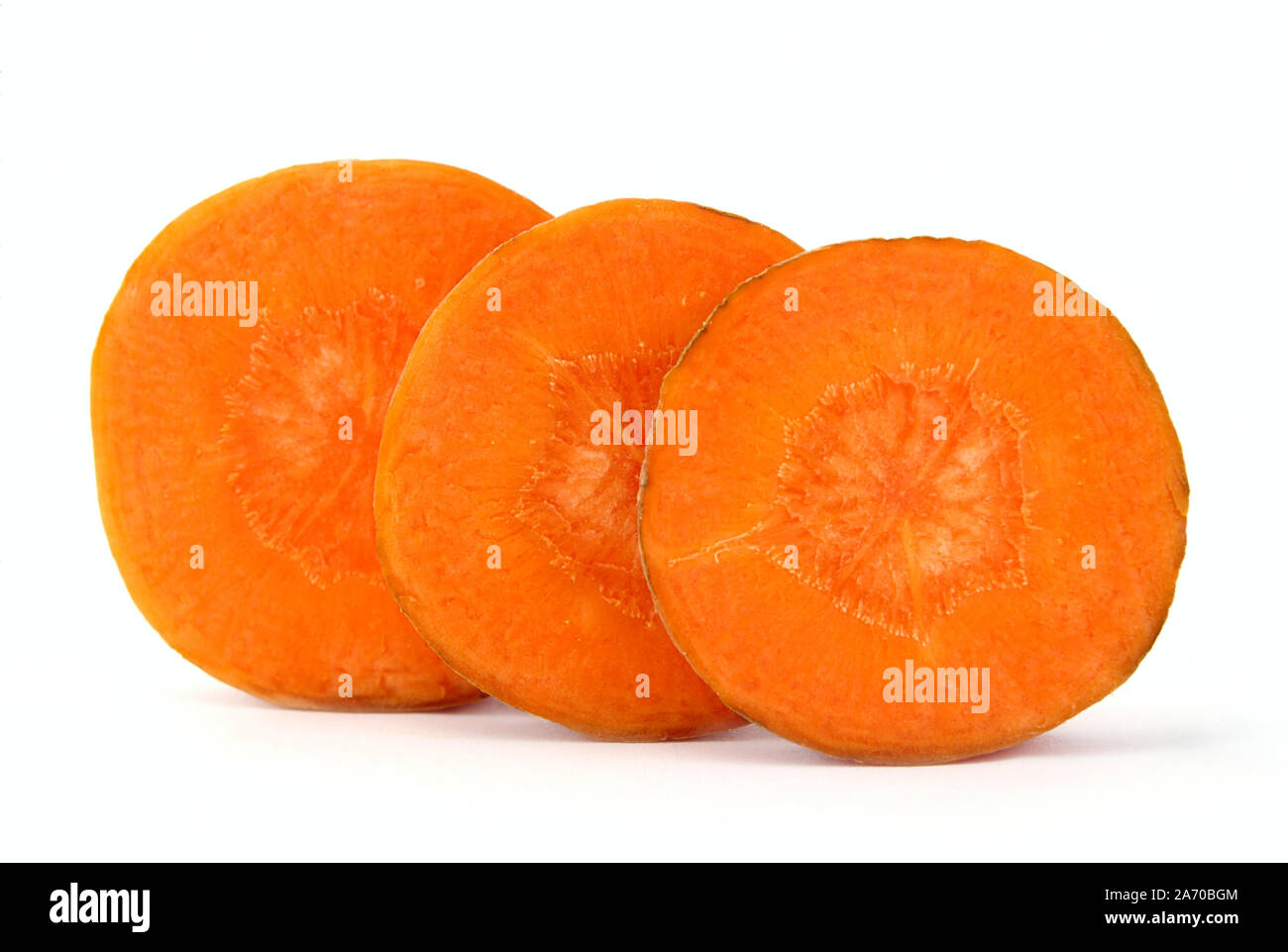 Carrot slice texture Cut Out Stock Images & Pictures - Alamy