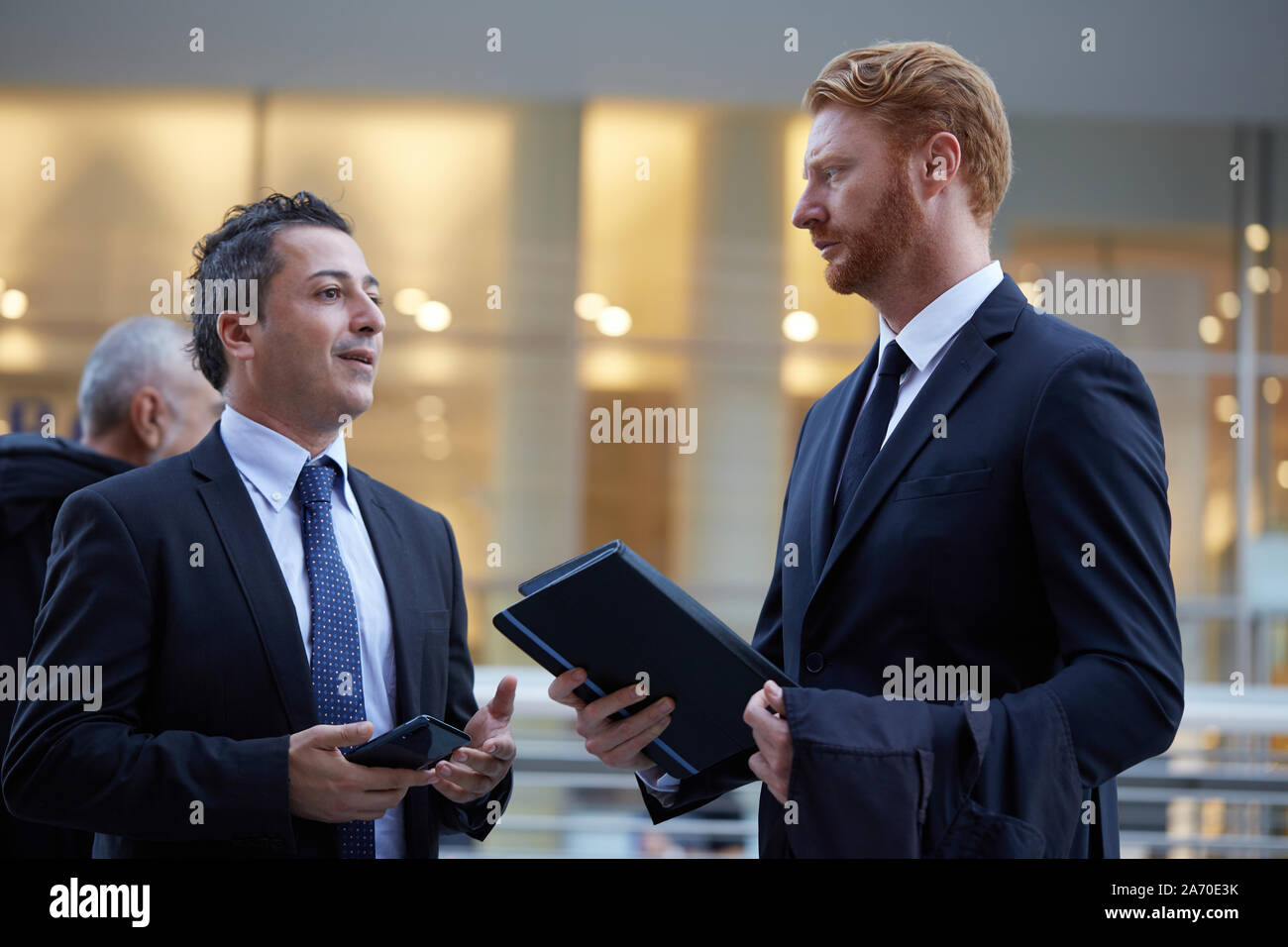 business people working outside office building Stock Photo - Alamy