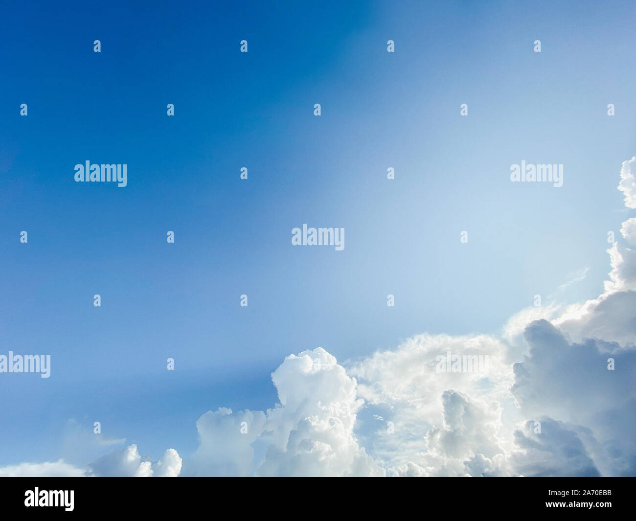 View of bright blue sky with clouds Stock Photo - Alamy