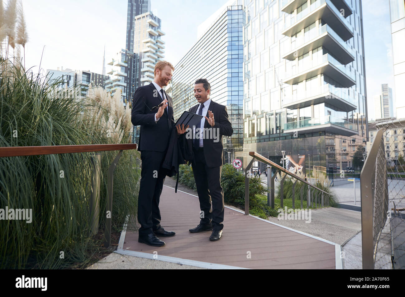 Group businesspeople outside office building hi-res stock photography ...