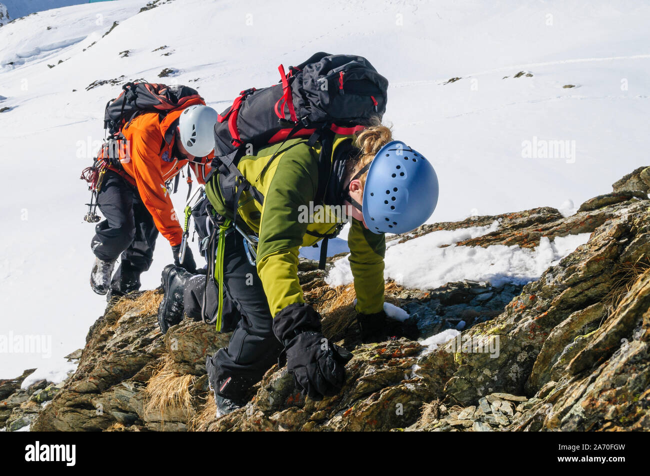 Rope team on the way in high alpine region near Gressoney in Italy ...