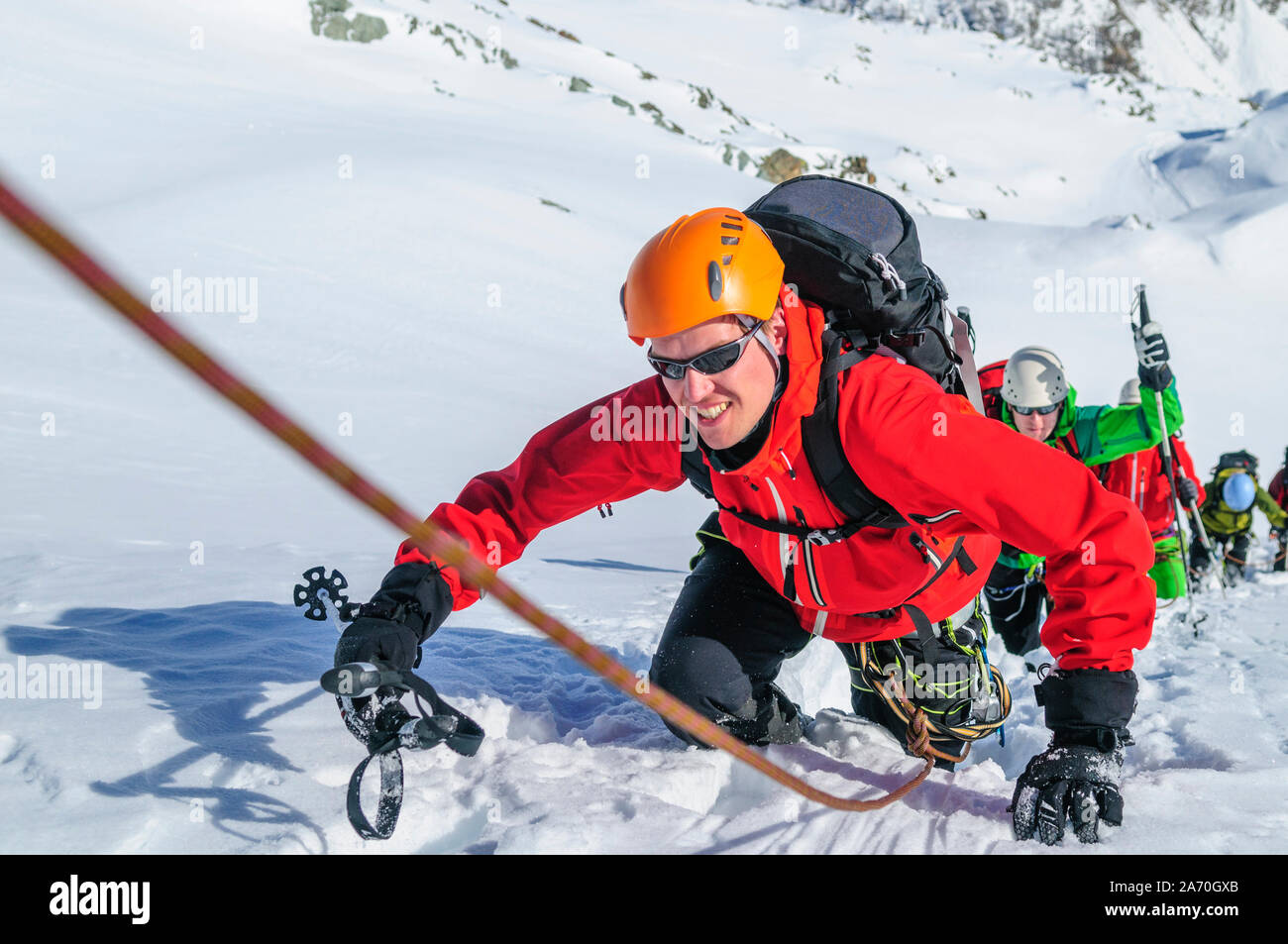 Rope team ascending mountain hi-res stock photography and images - Alamy