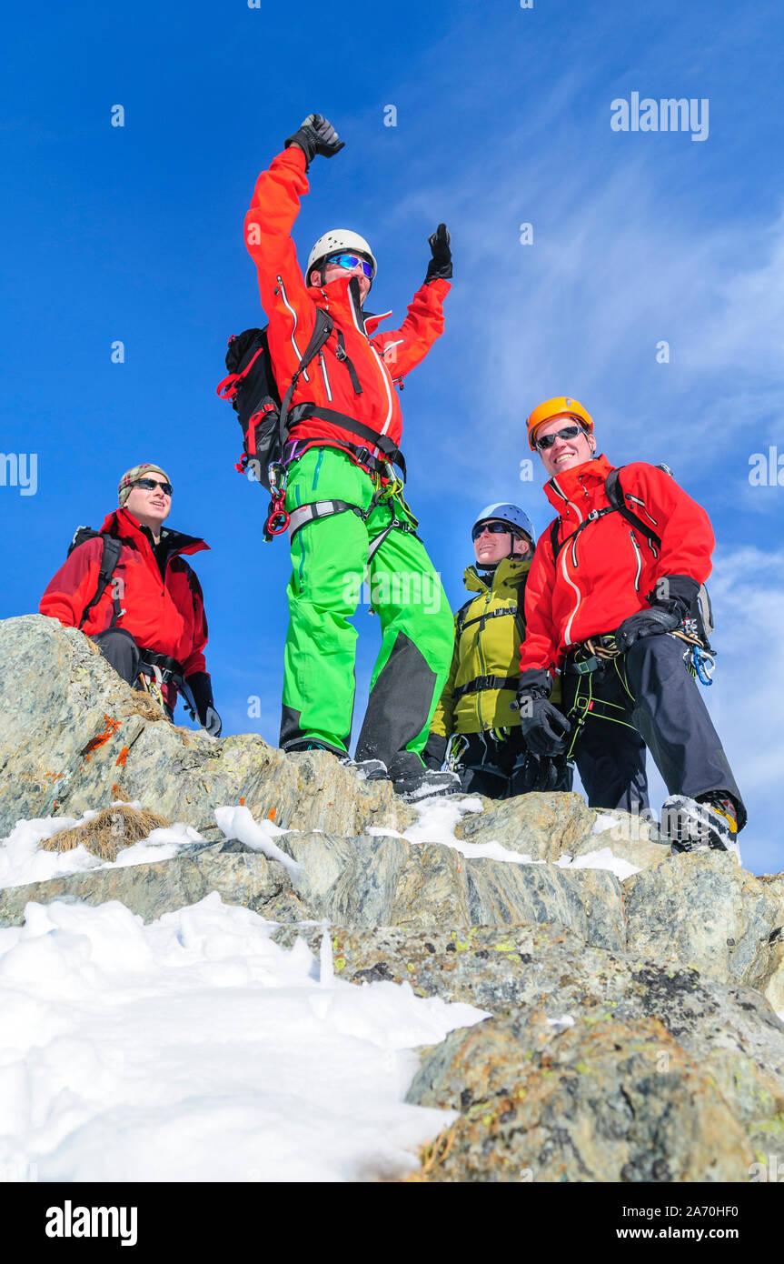 Adventurers on summit of a high alpine tour in Monte Rosa Stock Photo ...