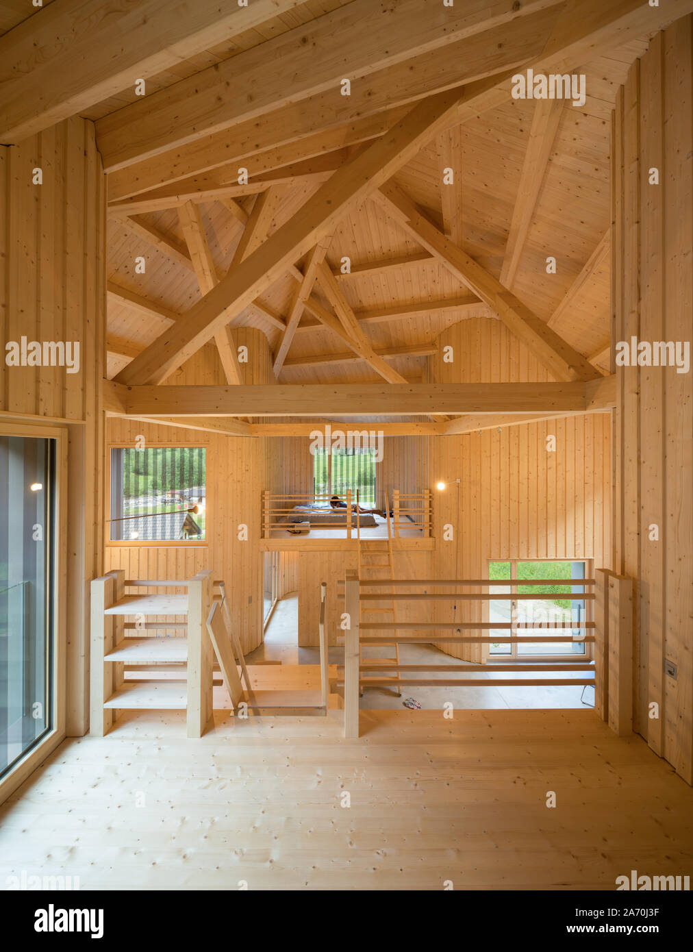 Modern house, wooden interiors open space Stock Photo - Alamy