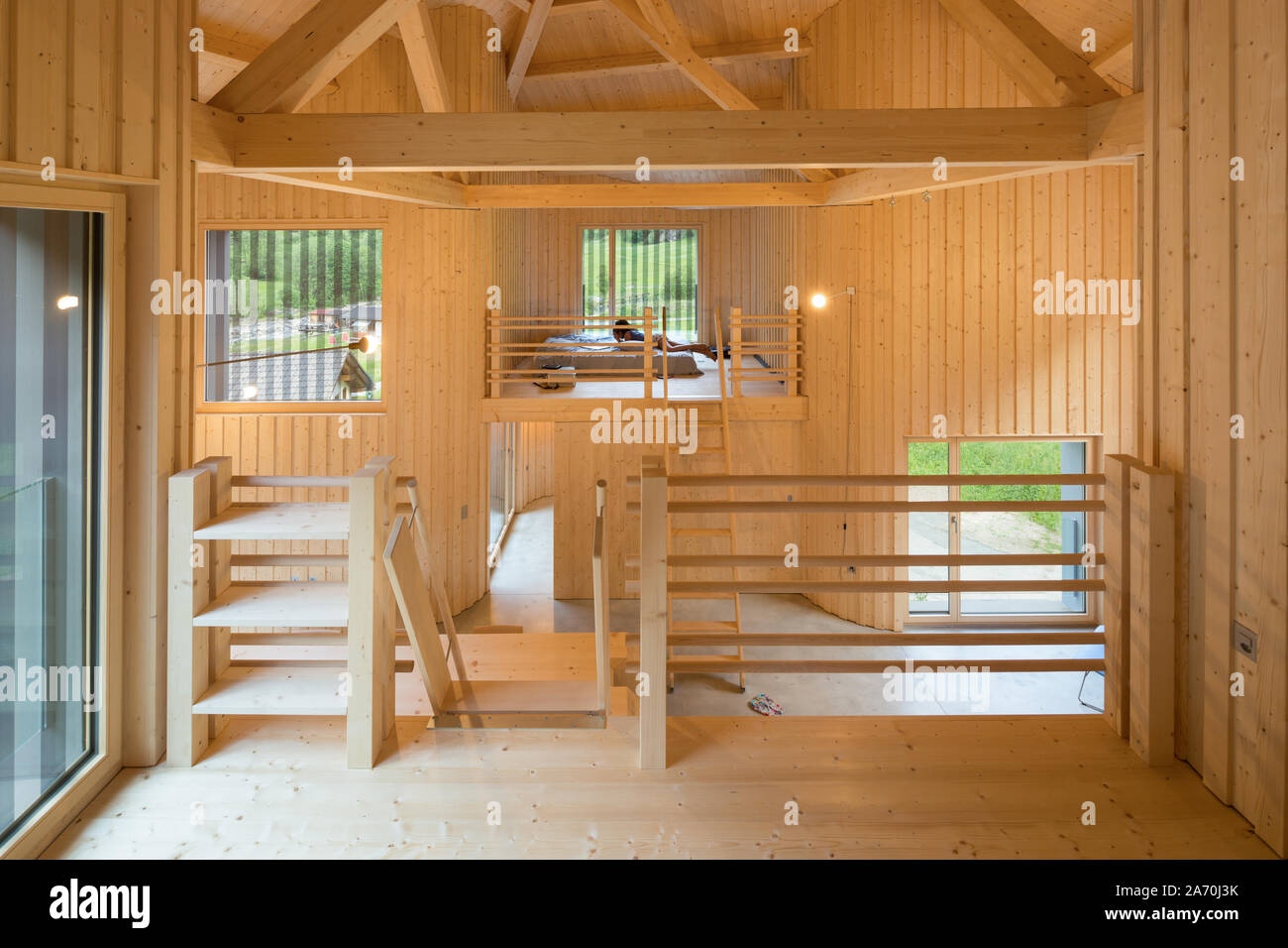 Modern house, wooden interiors open space Stock Photo - Alamy
