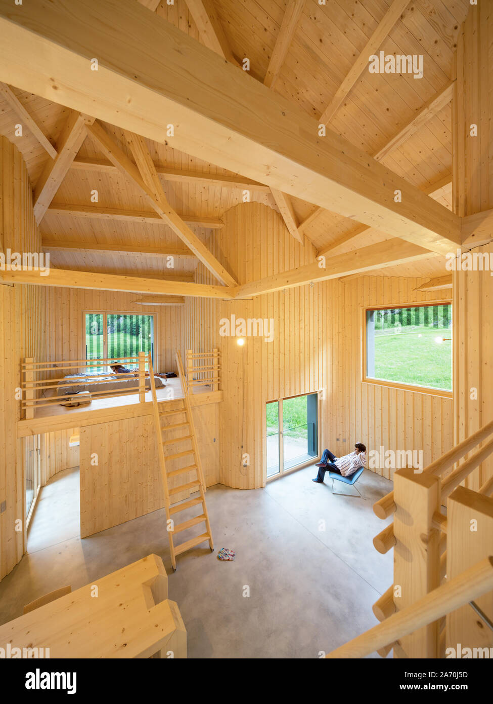 Modern house, wooden interiors open space Stock Photo - Alamy