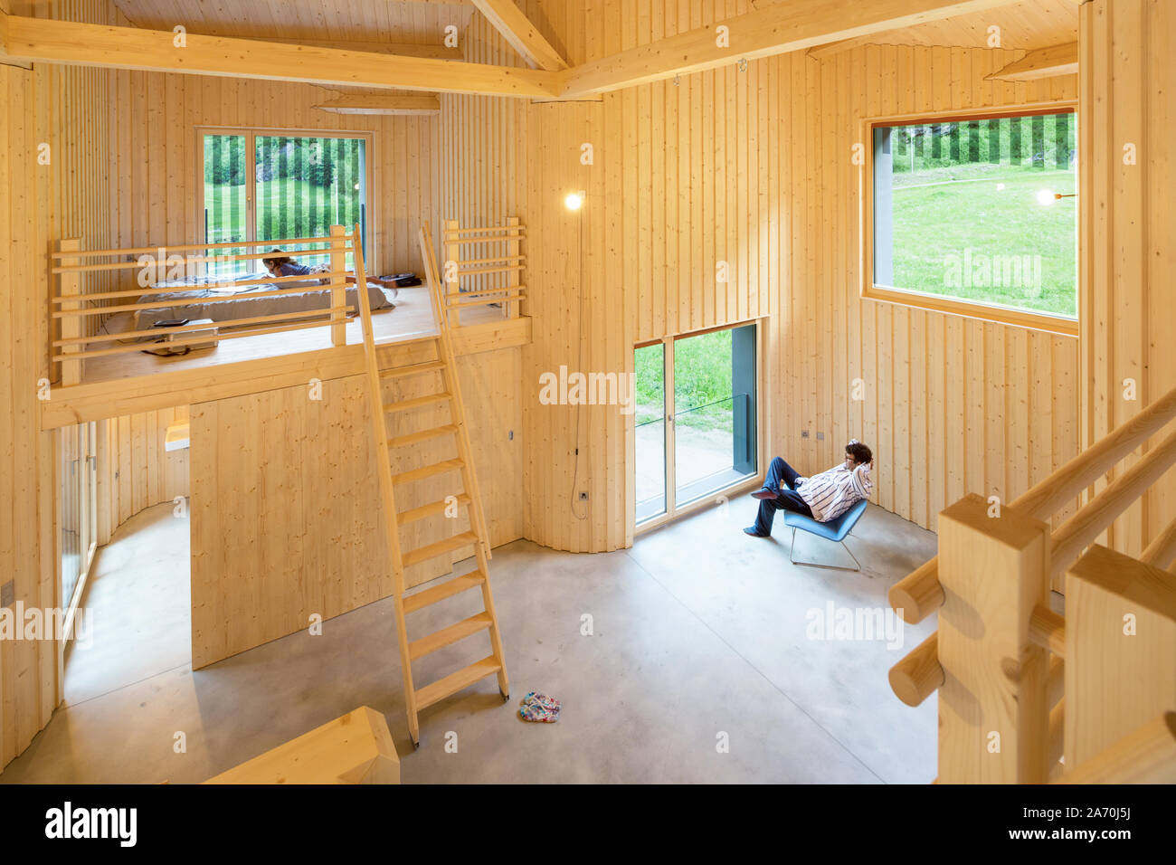 Modern house, wooden interiors open space Stock Photo - Alamy