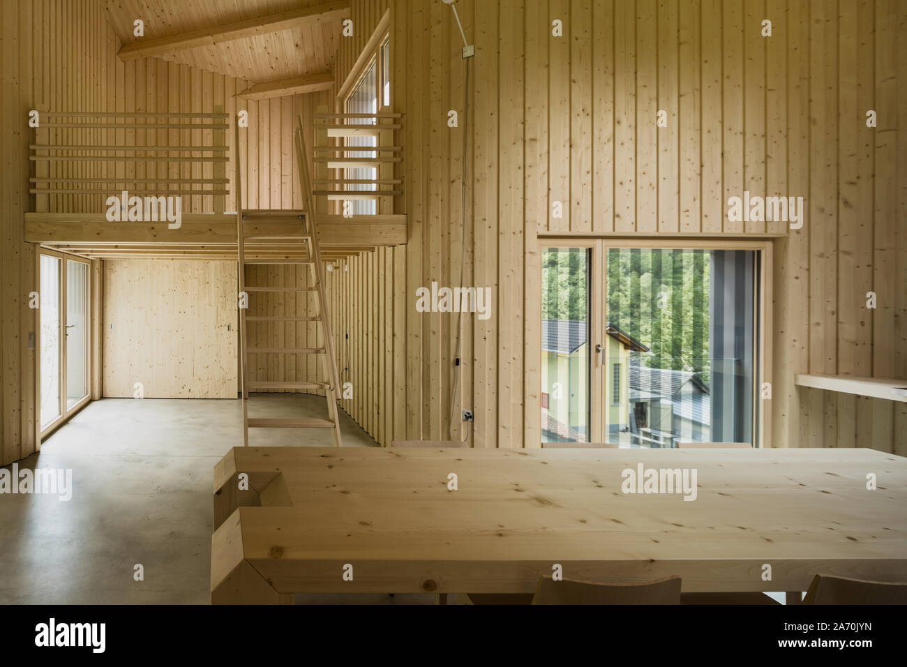 Modern house, wooden interiors open space Stock Photo - Alamy