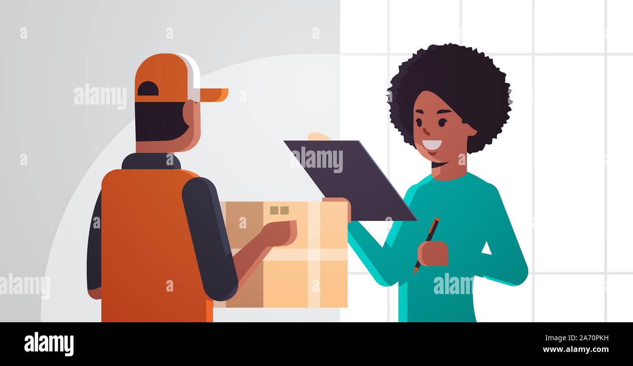 courier man delivering cardboard parcel box to african american woman ...