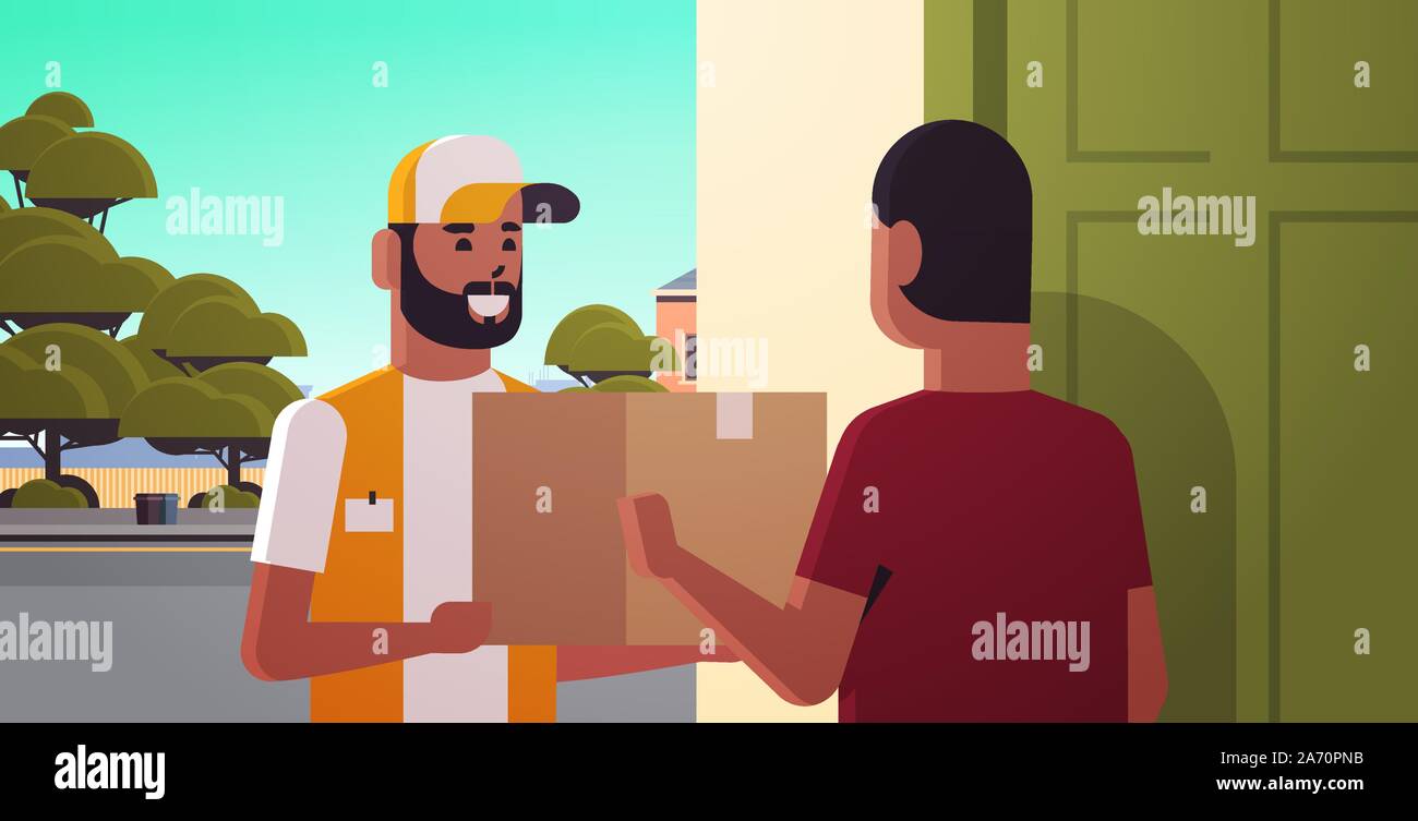 courier man delivering cardboard parcel box to african american guy ...