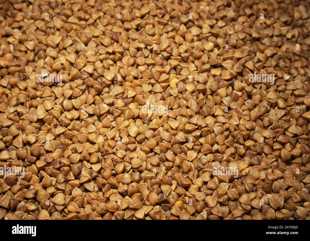Buckwheat background. Roasted buckwheat. Healthy food Stock Photo - Alamy