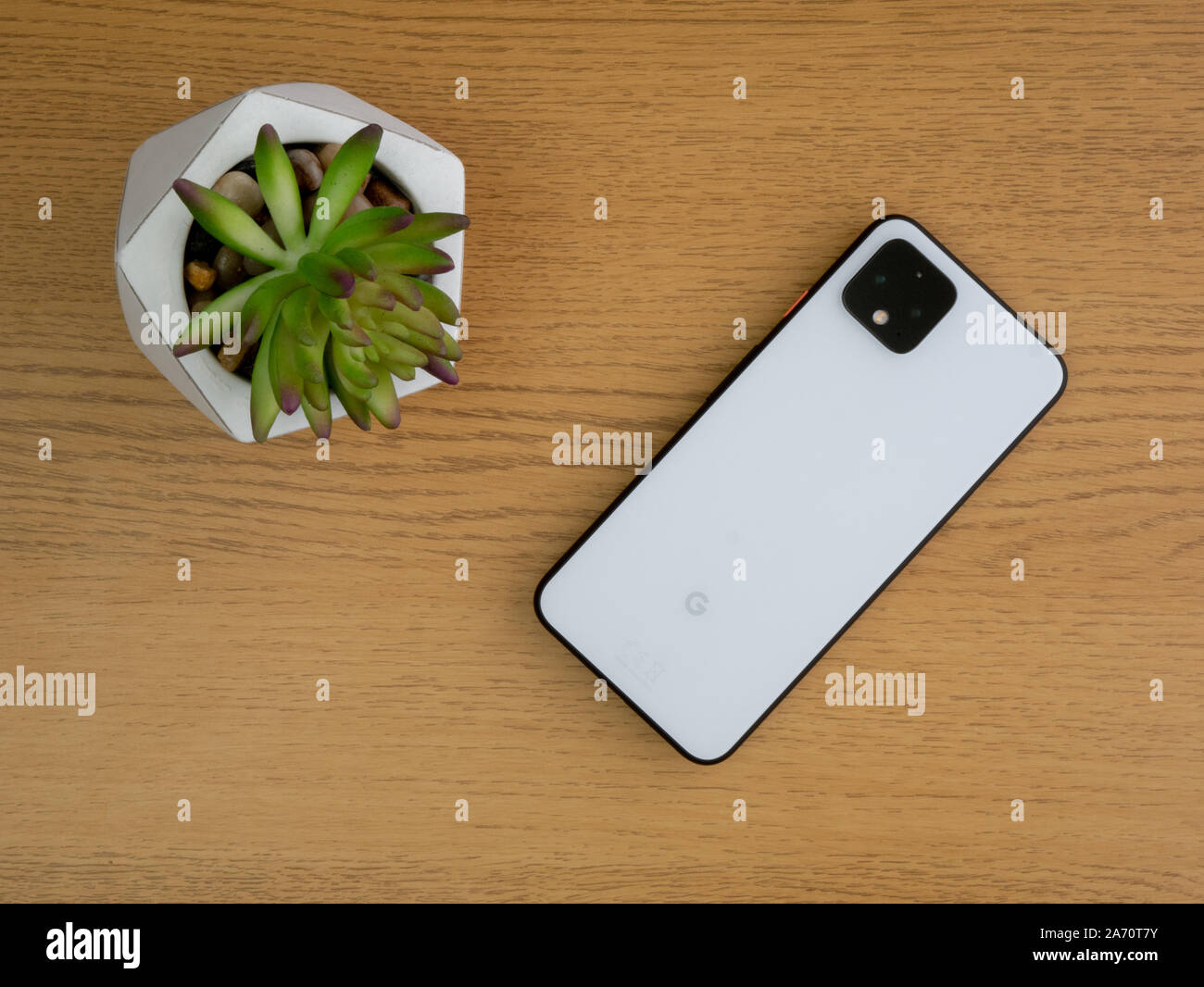 UK, October 2019: Pixel 4 smart phone on coffee table top down face ...