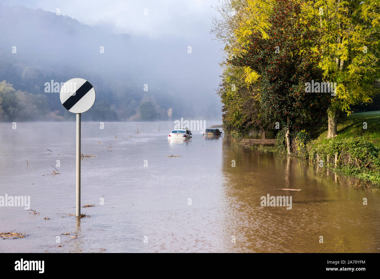 Cars stuck in flood water on B4234 beside the River Wye on the ...