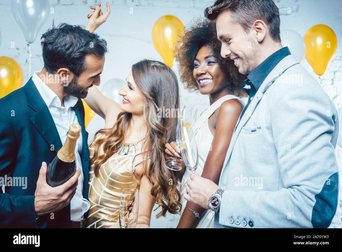 Party people with drinks celebrating new year or a birthday party Stock ...