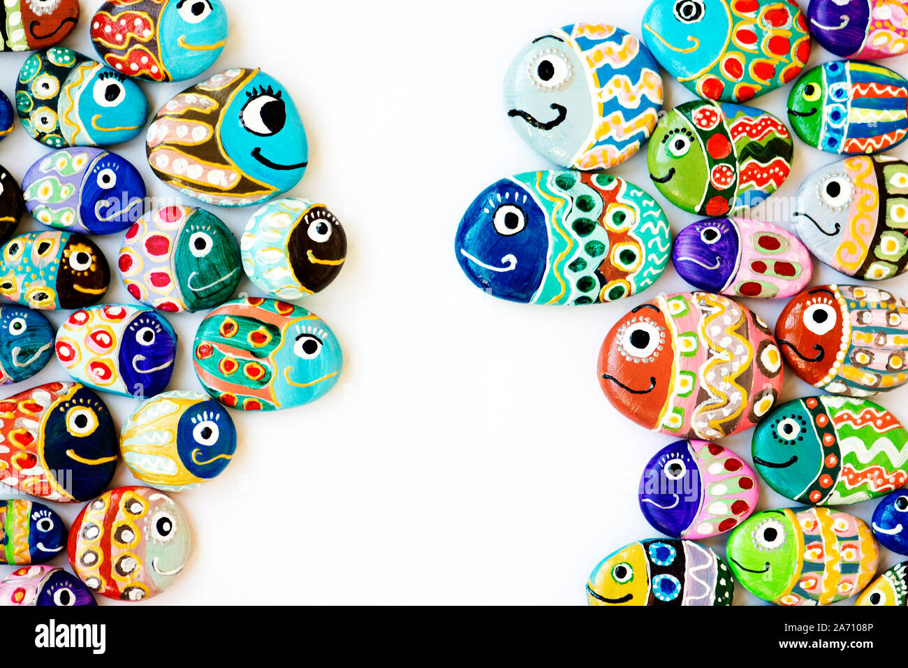 Funny painted acrylic pebbles background Stock Photo - Alamy