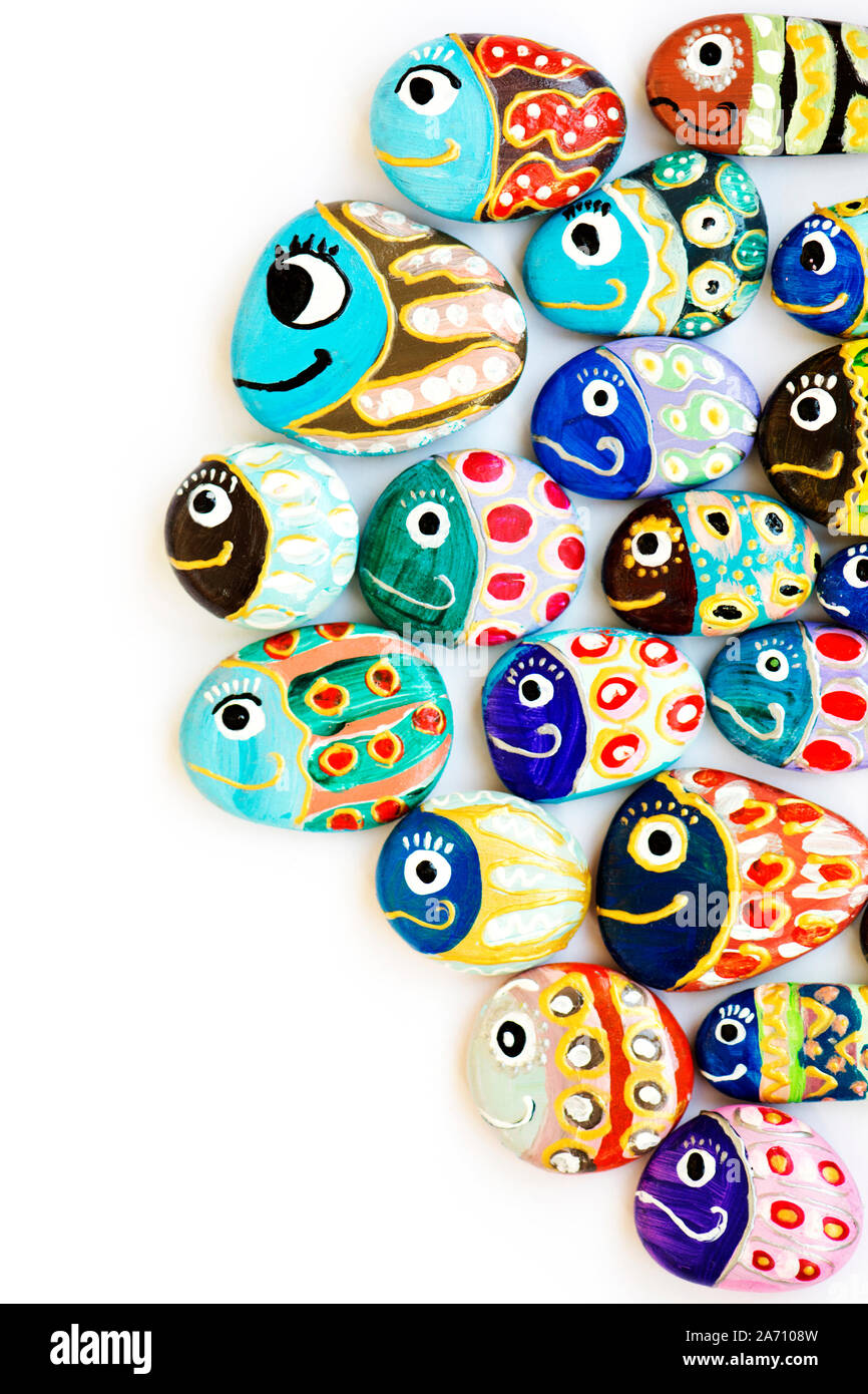 Funny painted acrylic pebbles background Stock Photo - Alamy