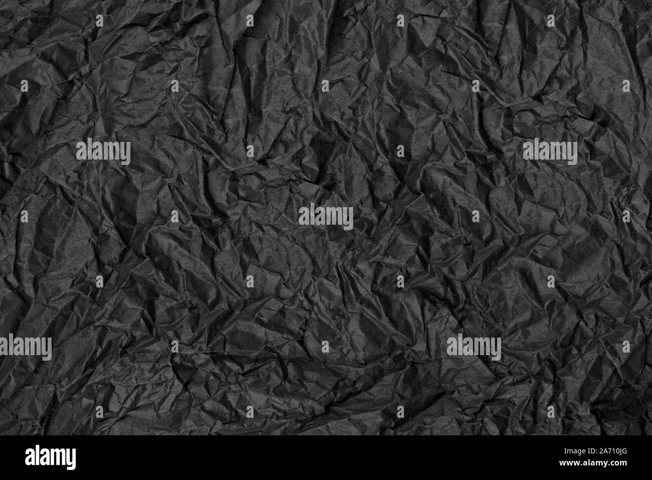 Black wrinkled paper hi-res stock photography and images - Alamy