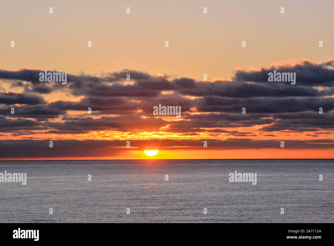Photo Picture of a Beautiful Colored Sunset Stock Photo - Alamy
