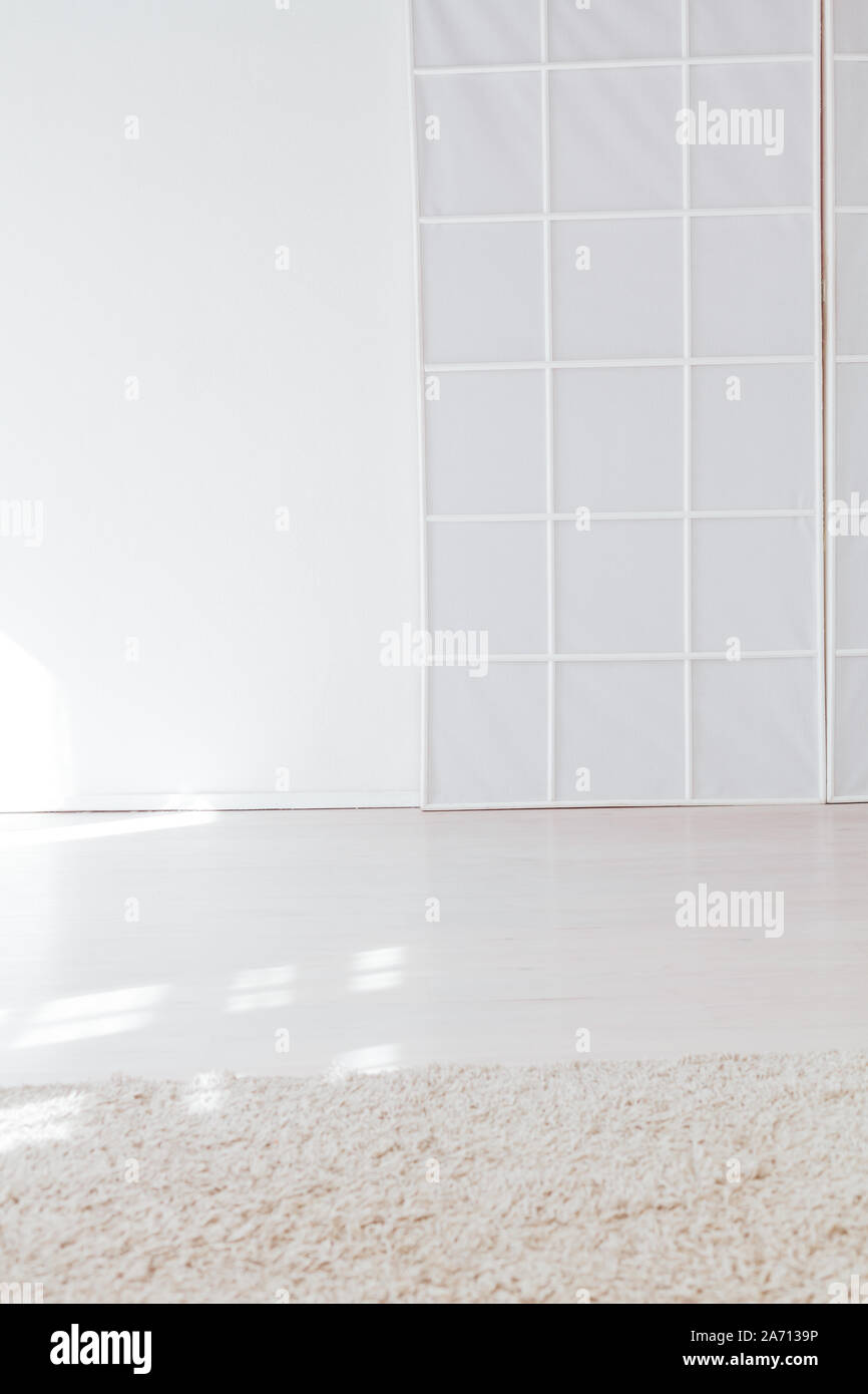 interior of an empty white room with no people background Stock Photo ...