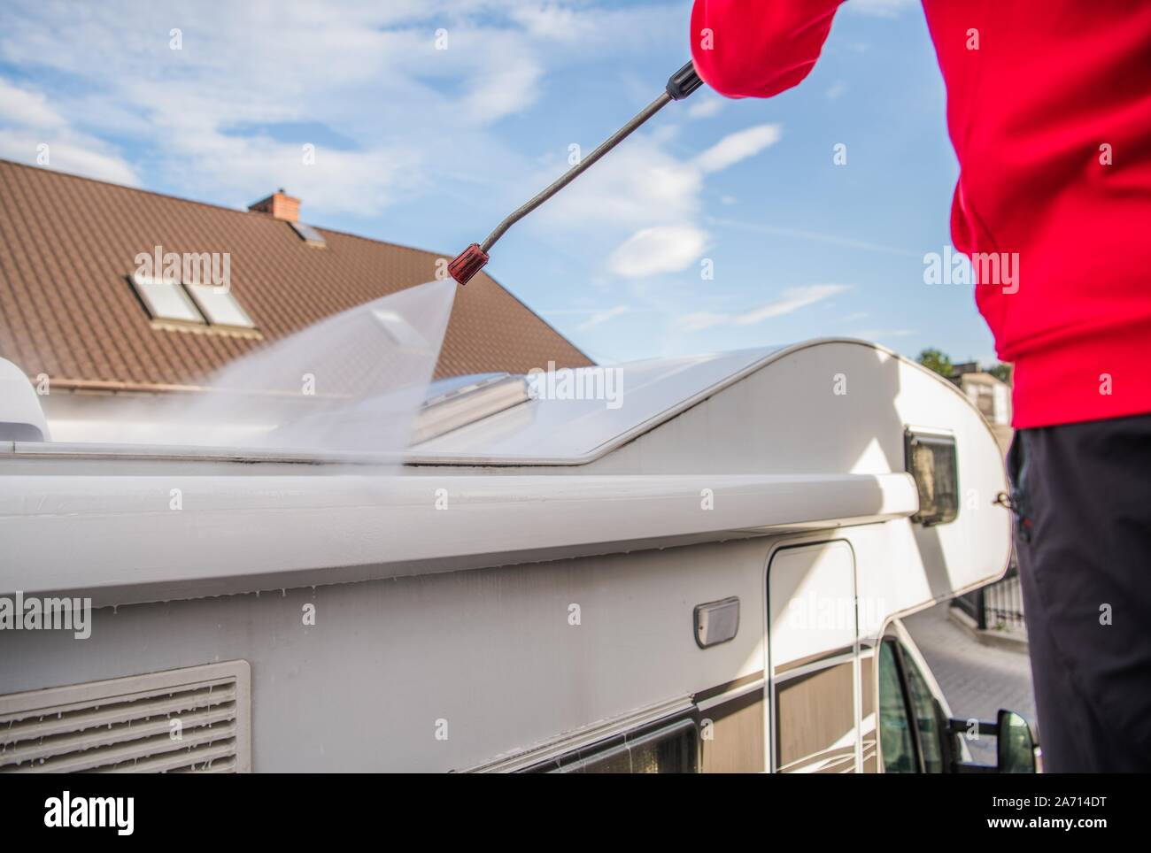 Power RV Roof Washing. Caucasian Men Pressure Washing His Camper Van ...