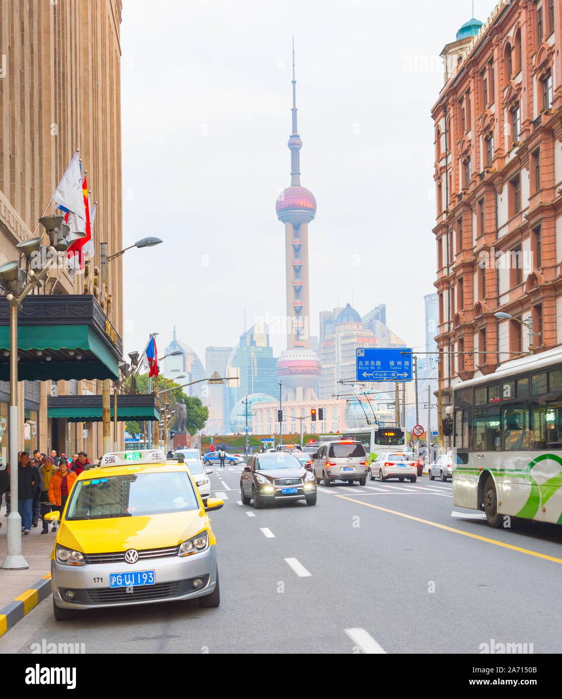 SHANGHAI, CHINA -DECEMBER 28, 2016: Traffic on the road in Downtown of ...